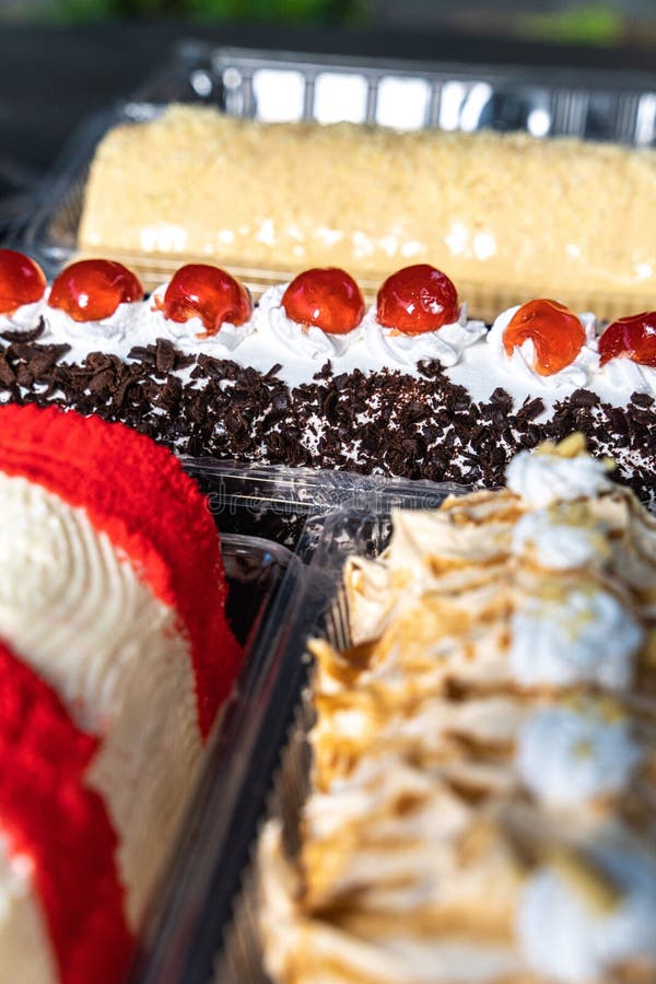 Delicious Roll Cakes in Plastic Containers Stock Photo - Image of ...