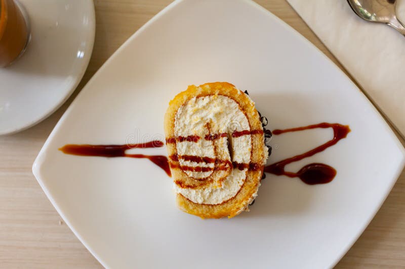 Delicious Roll Sponge Cake with Vanilla Cream Stock Image - Image of ...