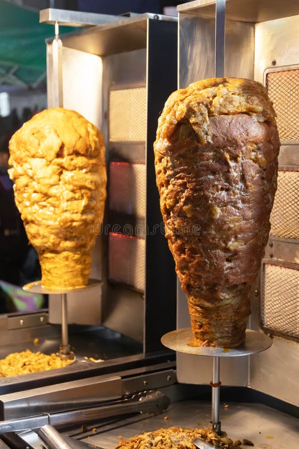 Delicious Rotating Meat on a Spit for Kebab Stock Photo - Image of ...