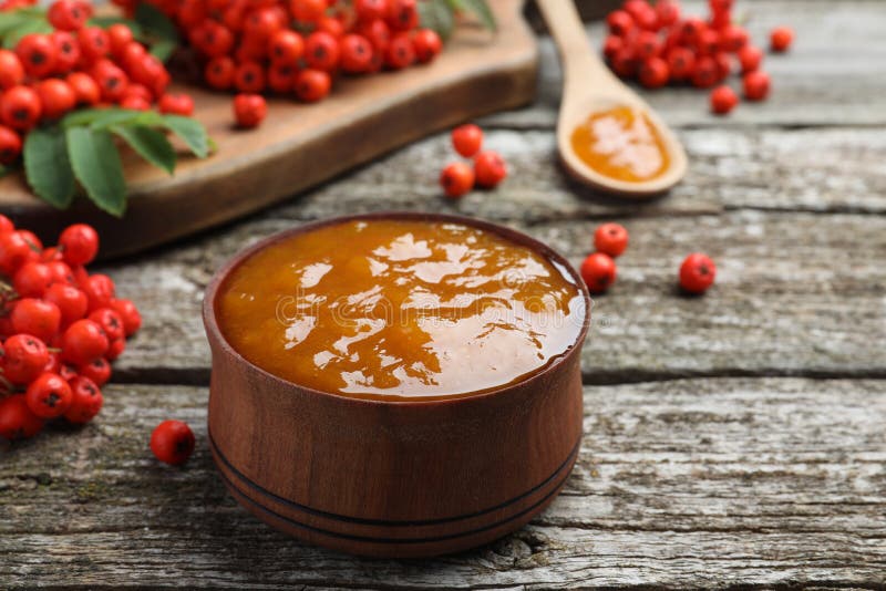 Delicious Rowan Jam in Bowl on Wooden Table. Space for Text Stock Photo ...