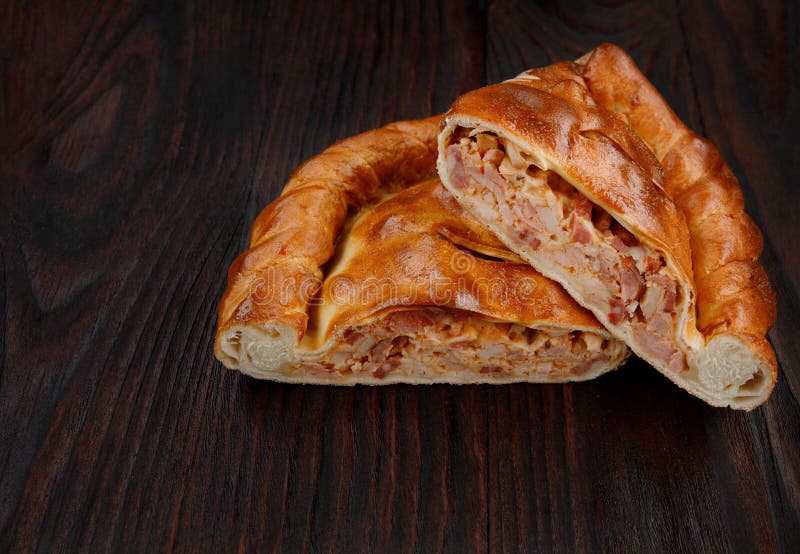 Delicious Rustic Pie with Meat on a Wooden Surface Stock Photo - Image ...