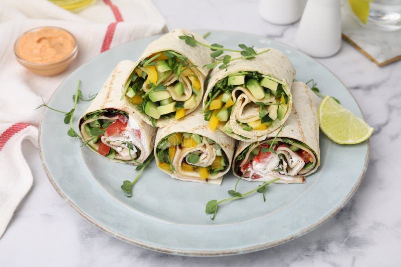 Delicious Sandwich Wraps with Fresh Vegetables and Slice of Lime on ...