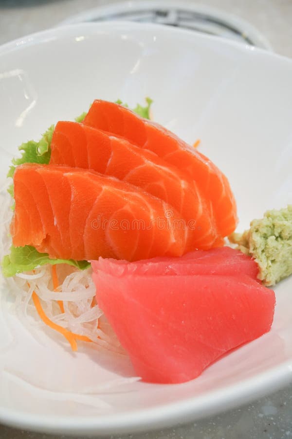Delicious Sashimi on a Plate. Stock Photo - Image of black, salmon ...