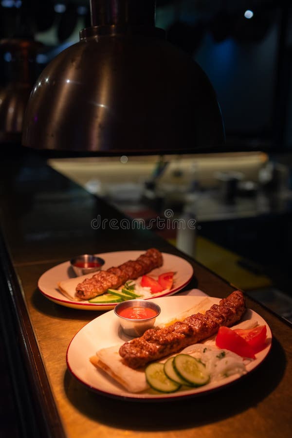 Delicious Seekh Kabab Served in Plate at Table. Stock Photo - Image of ...