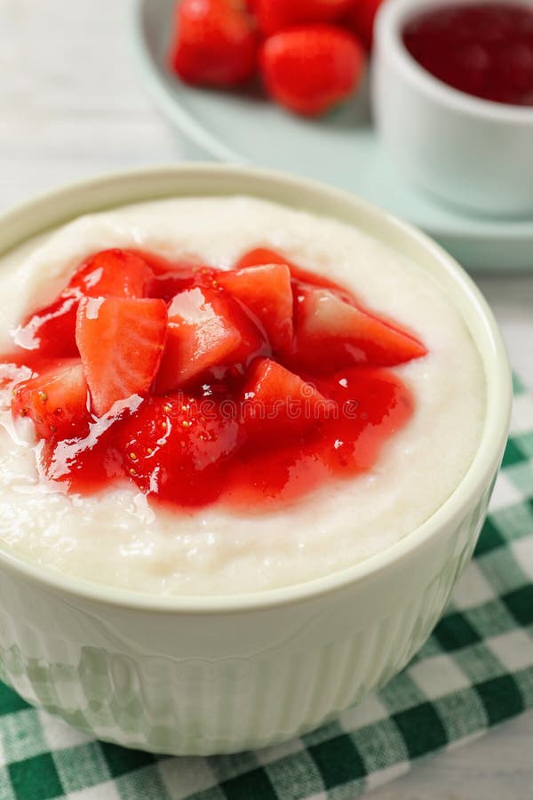 Delicious Semolina Pudding with Strawberries and Jam on White Table ...