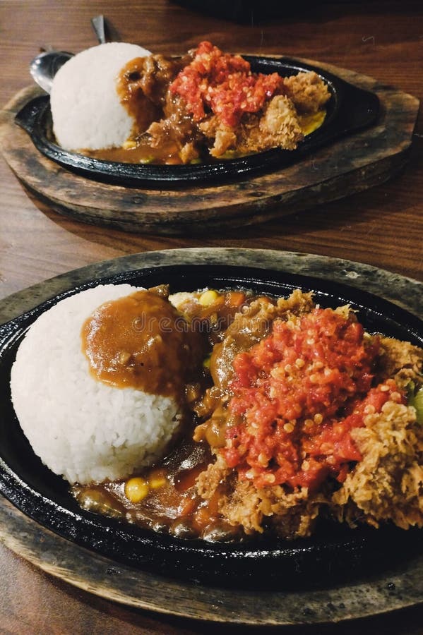 A Delicious Serving of a Sizzling Hot Plate Meal Stock Image - Image of ...