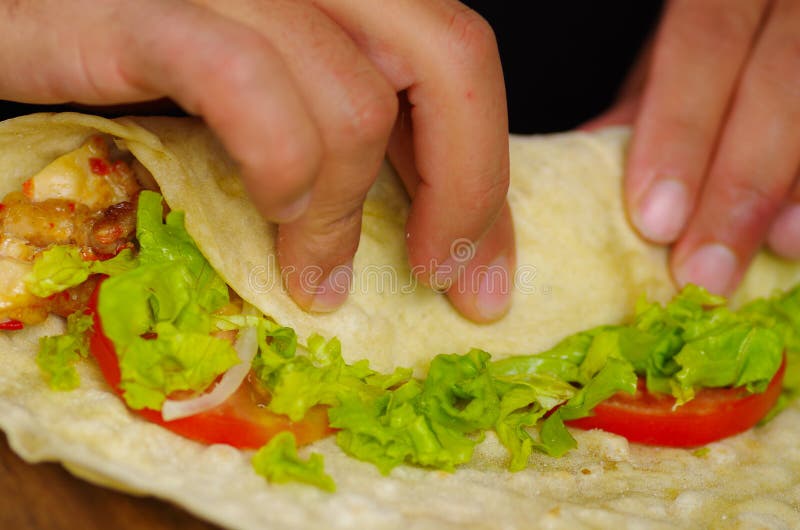 Delicious Shawarma Being Wrapped, Inside with Meat and Vegetables ...