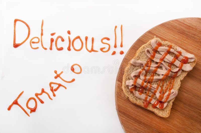 Delicious Sign with Ketchup and Mmmm on the Bread with Pate Stock Photo ...