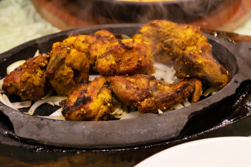 Delicious Sizzling Chicken on a Hot Plate Stock Image - Image of crispy ...