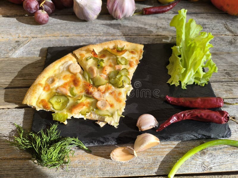 Delicious Slice of Pizza on a Granite Sliced Board is Delicious and ...