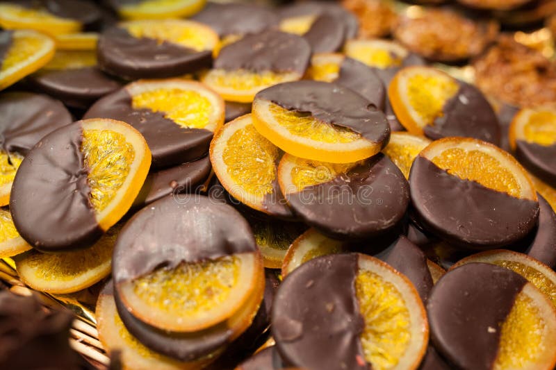 Slices of Orange in Chocolode on Counter Stock Image - Image of milk ...