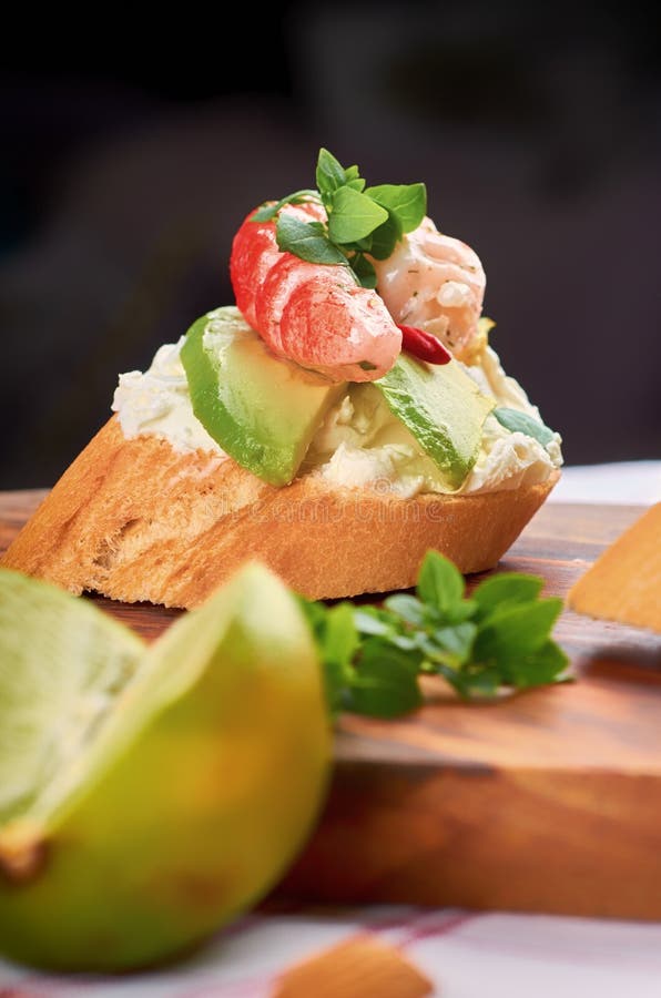 Delicious Snacks with Shrimp, Fish and Avocado Stock Image - Image of ...