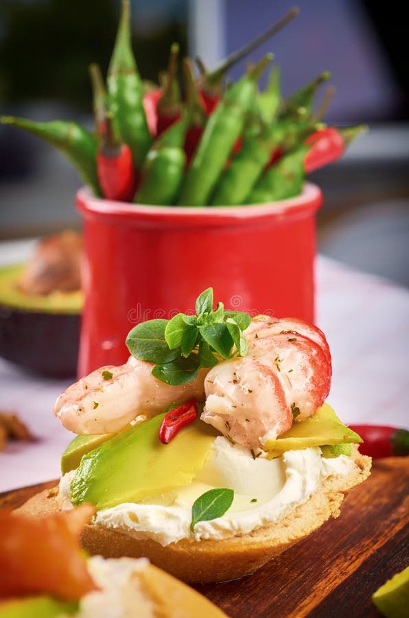 Delicious Snacks with Shrimp, Fish and Avocado Stock Image - Image of ...