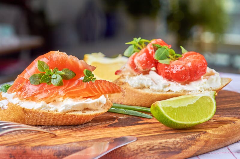 Delicious Snacks with Shrimp, Fish and Avocado Stock Photo - Image of ...