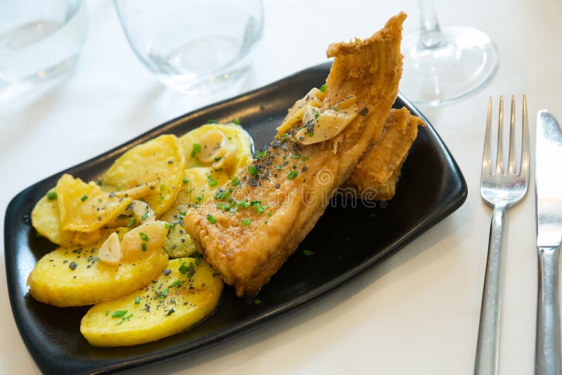 Roasted Ray Wings with Potatoes Stock Photo - Image of wings, dinner ...