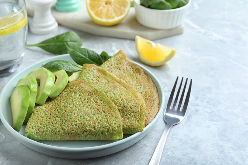 Delicious Spinach Crepes with Avocado Served on Table Stock Image ...