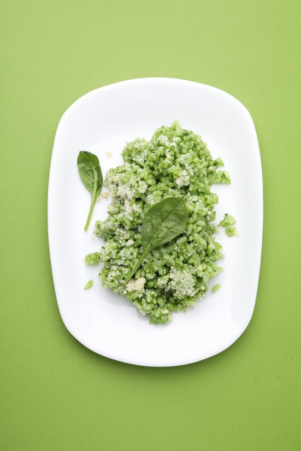 Delicious Spinach Risotto with Parmesan Cheese on Light Green ...