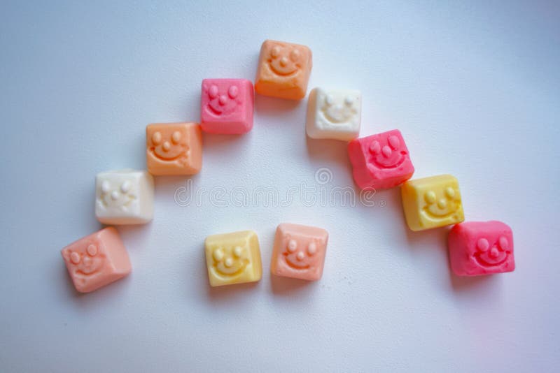 Delicious Square Bright Candy with Smile on White Background Editorial ...