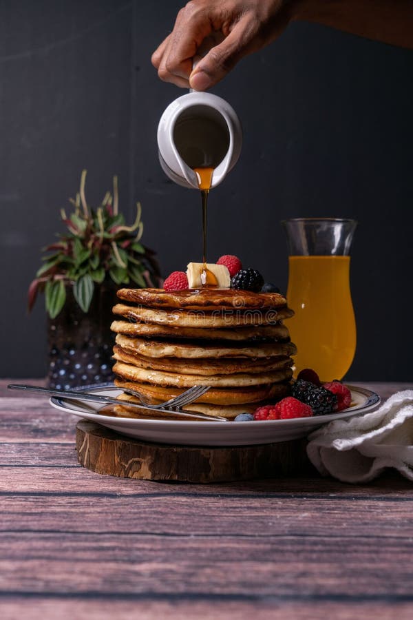 Delicious Stack of Fluffy Pancakes Topped with Sticky, Sweet Syrup ...