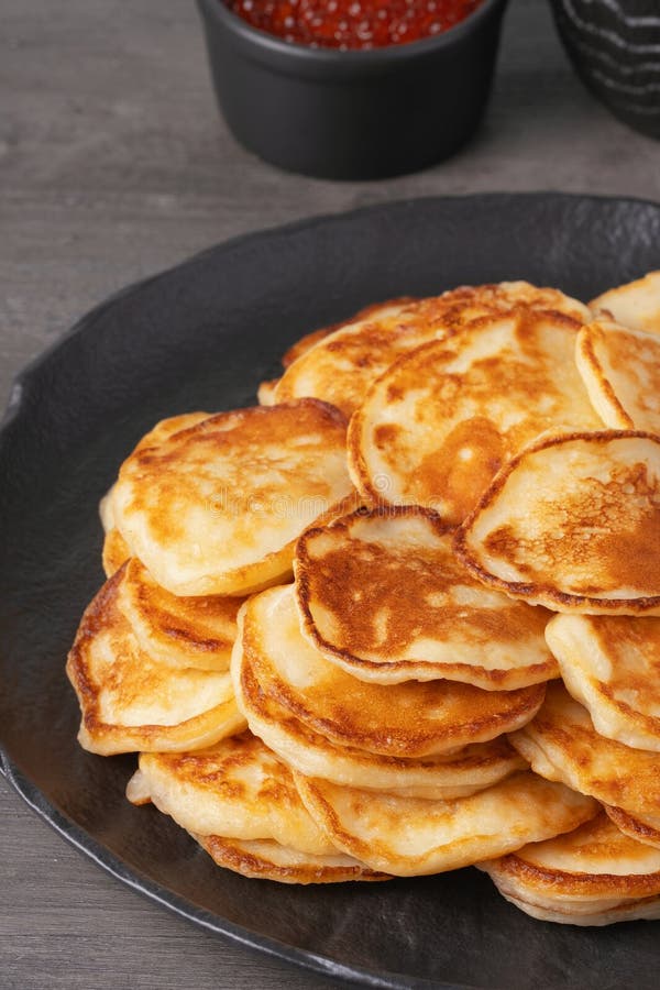 Delicious Stack of Golden Pancakes Served with Cream and Caviar on a ...