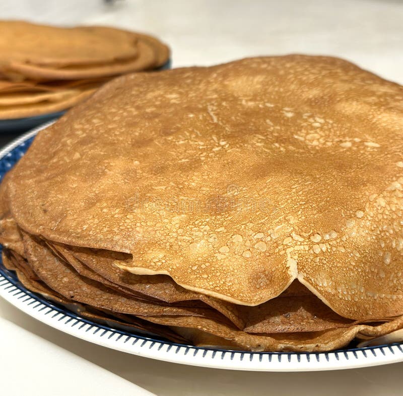 Stack of Crepes on Kitchen Table. Pancakes for Breakfast, Food ...