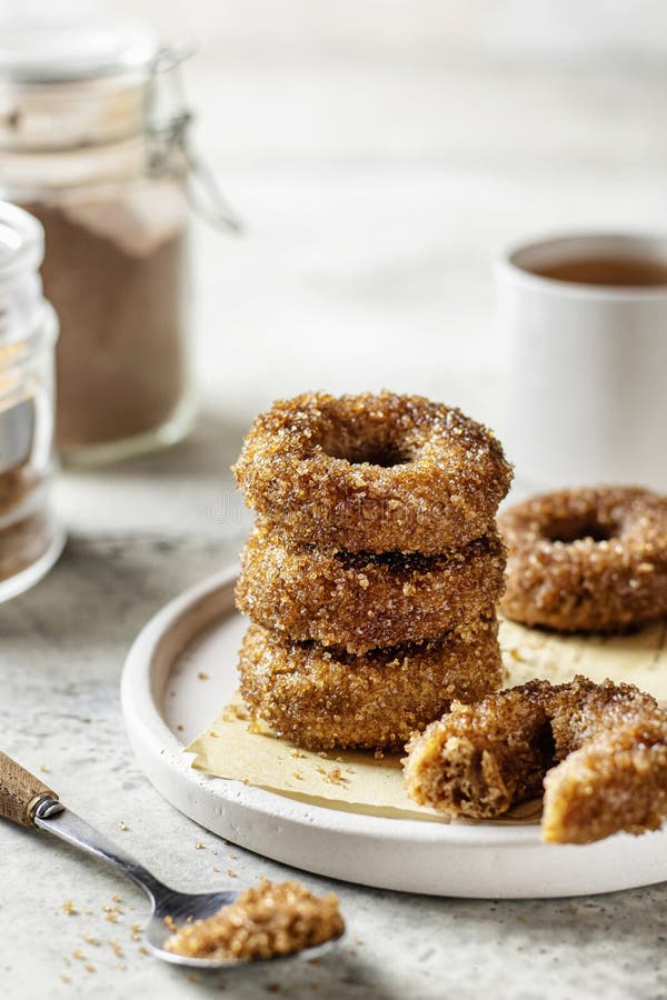 Delicious Stack of Sugar Coated Donuts on a Plate on White Textured ...