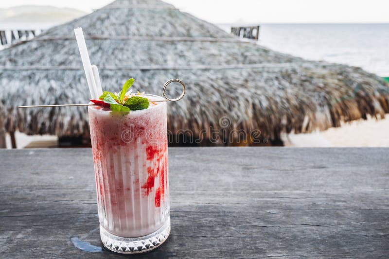Delicious Strawberry Milkshake on the Beach. Stock Photo - Image of ...