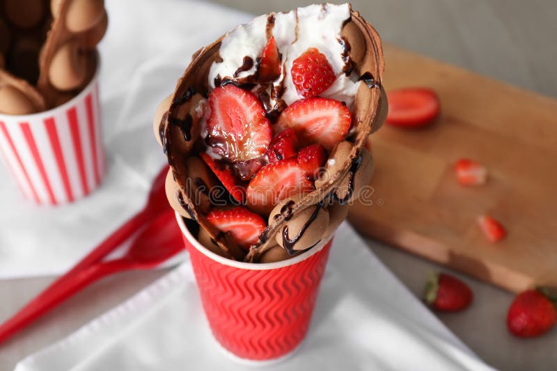 Delicious Sweet Bubble Waffle in Cup on Table Stock Photo - Image of ...