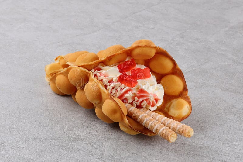 Delicious Sweet Bubble Waffle on Table Stock Image - Image of sweet ...