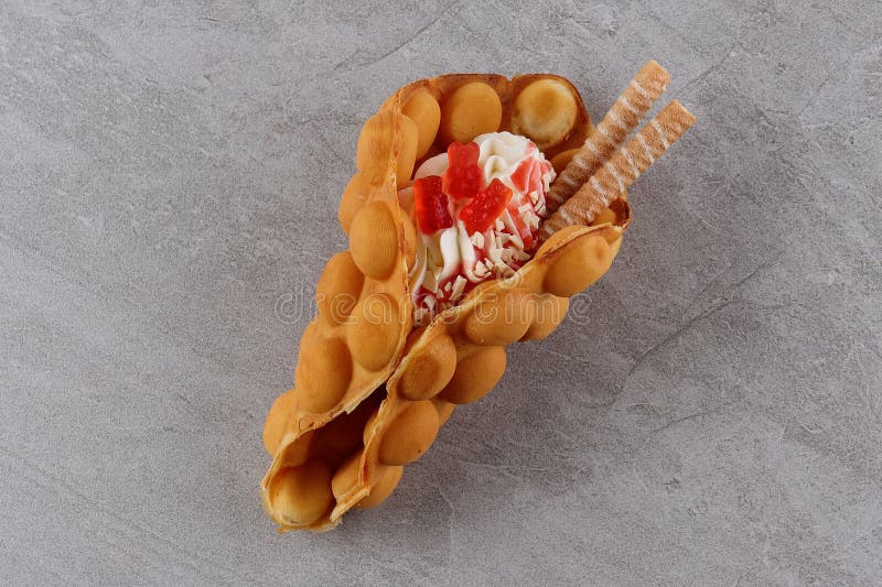 Delicious Sweet Bubble Waffle on Table Stock Image - Image of sweet ...