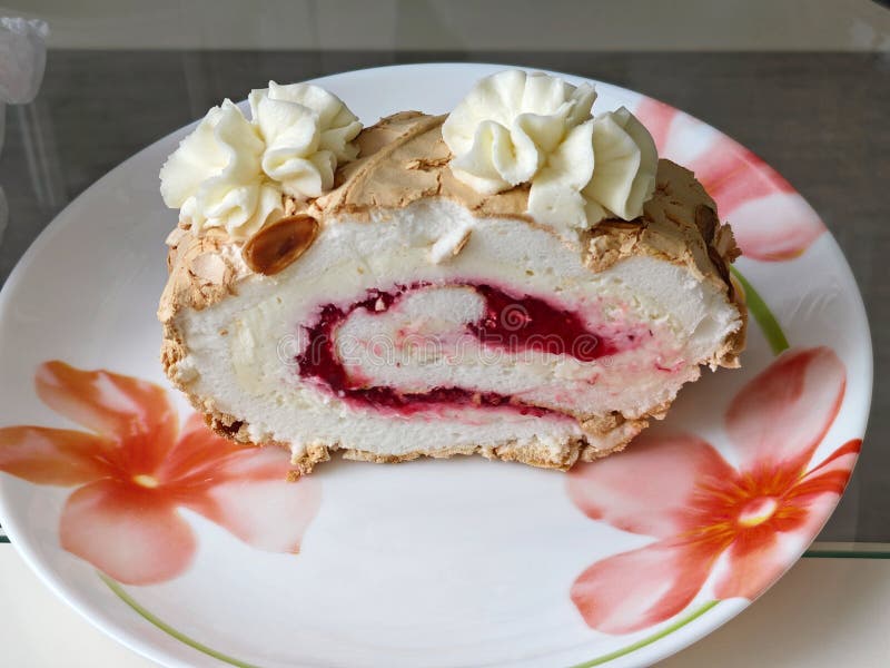 Delicious Sweet Meringue Roll on a Plate Stock Photo - Image of dessert ...