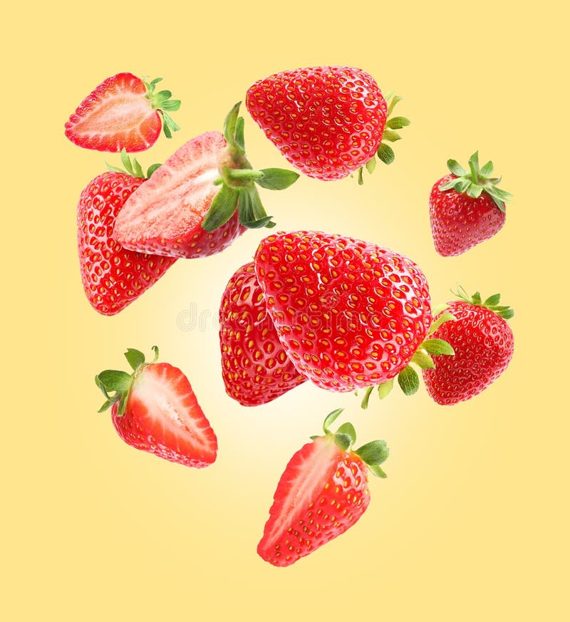 Delicious Sweet Strawberries Falling on Pale Yellow Background Stock ...
