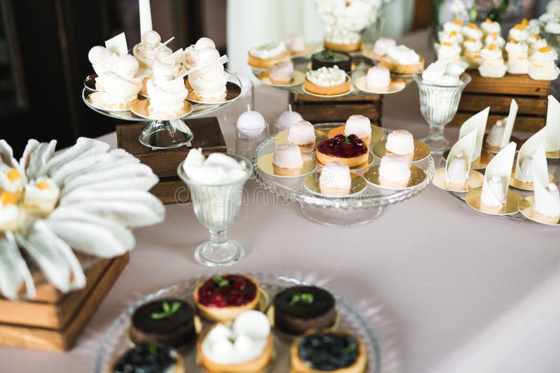 Delicious Sweets on Wedding Candy Buffet with Desserts, Cupcakes Stock ...