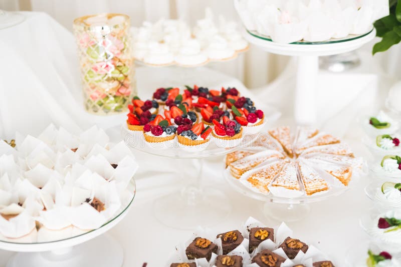 Delicious Sweets on Wedding Candy Buffet with Desserts, Cupcakes Stock ...