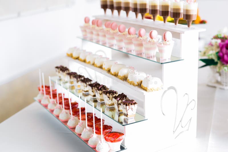 Delicious Sweets on Wedding Candy Buffet with Desserts, Cupcakes Stock ...