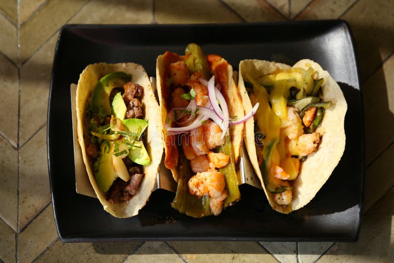 Delicious Tacos with Shrimps and Vegetables on Table, Top View Stock ...