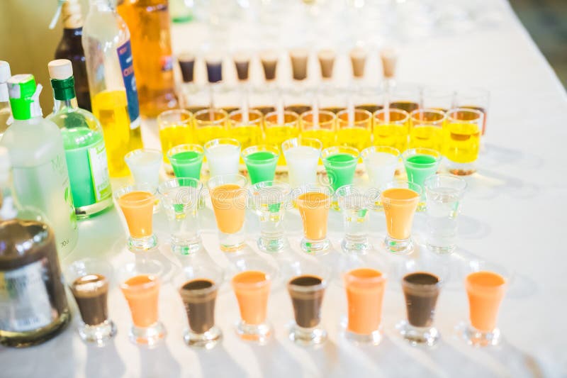 Delicious and Tasty Dessert Table with Cupcakes and Shots at Reception ...