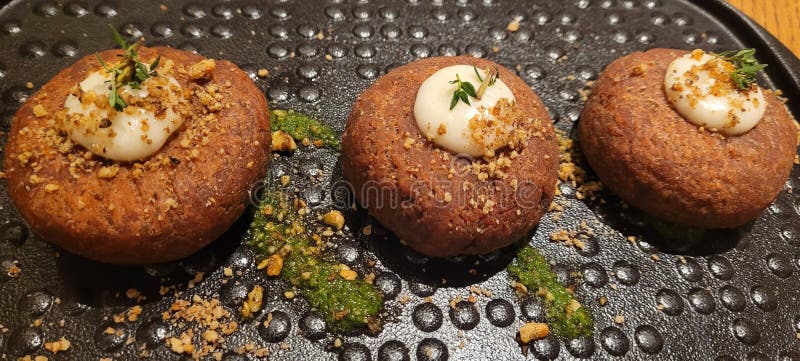 Delicious Three Balls in a Black Plate Stock Photo - Image of food ...