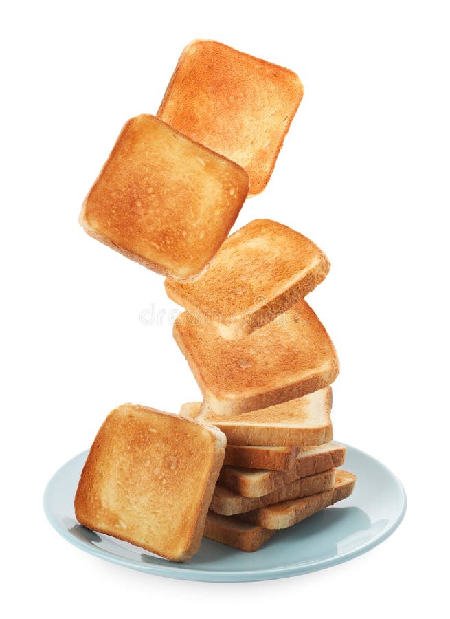 Delicious Toasted Bread Falling into Plate on White Background Stock ...
