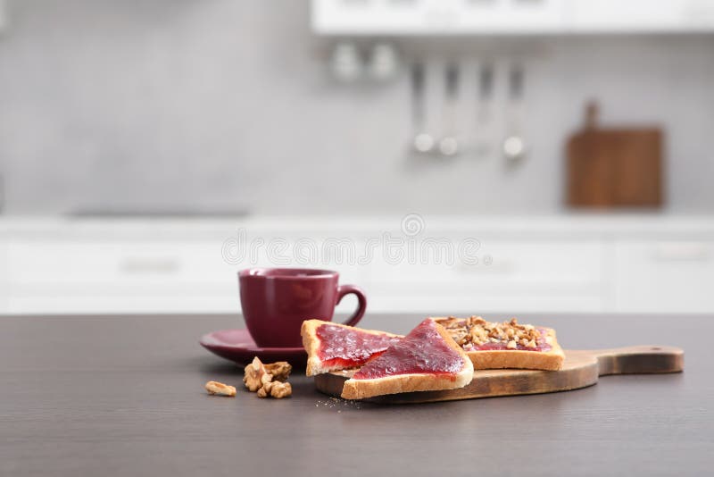 Delicious Toasts and Cup of Drink on Counter in Kitchen Stock Image ...