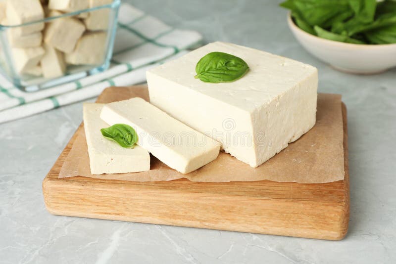 Delicious Tofu with Basil Served on Grey Marble Table Stock Photo ...