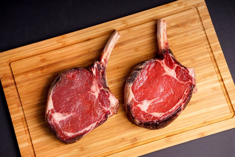 Raw Tomahawk Steak stock photo. Image of huge, large - 69821406
