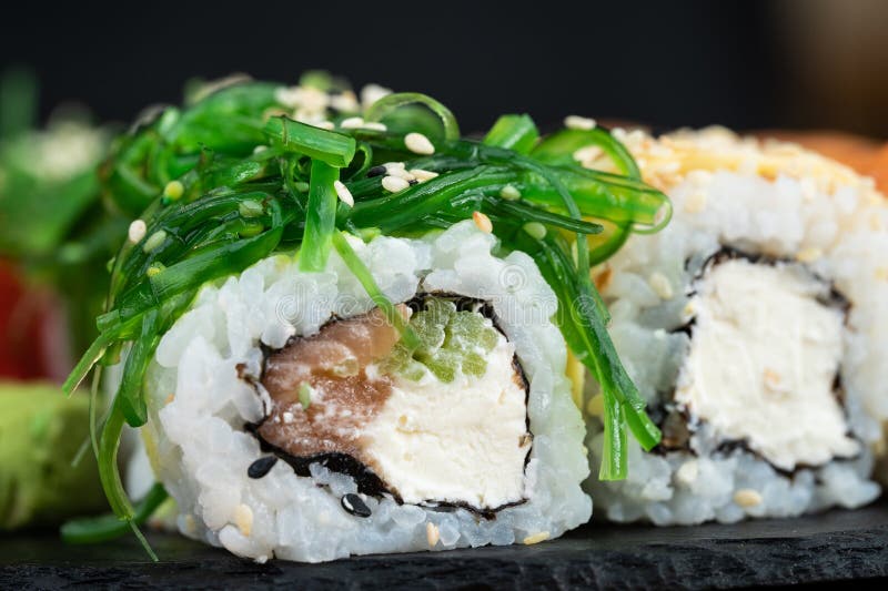 Delicious Traditional Japanese Sushi and Rolls on a Plate Stock Image ...