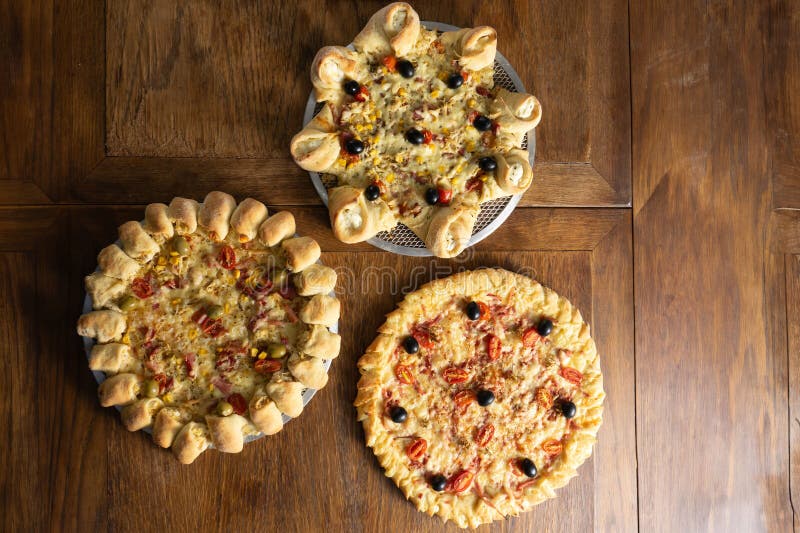 Delicious pizza trio. stock photo. Image of baked, melted - 301218376