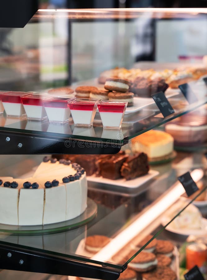 Delicious Variety of Cakes and Pastries in a Glass Display Case in Cafe ...