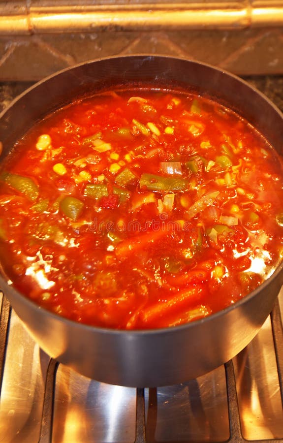 Delicious Vegetable Soup Simmering on a Stove. Stock Photo - Image of ...
