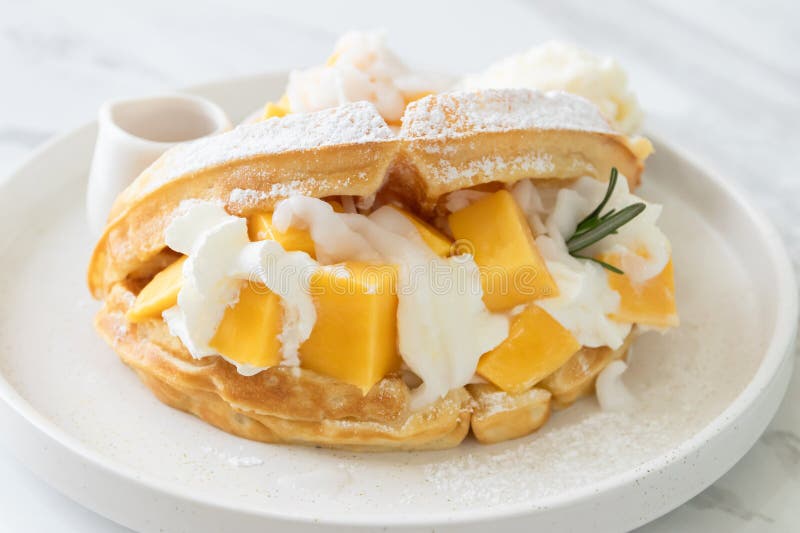 Delicious Waffle Mango Dessert with Young Coconut and Whipped Cream ...