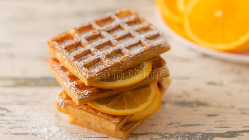 Delicious Waffles with Orange Slices on a Light Background Stock Photo ...