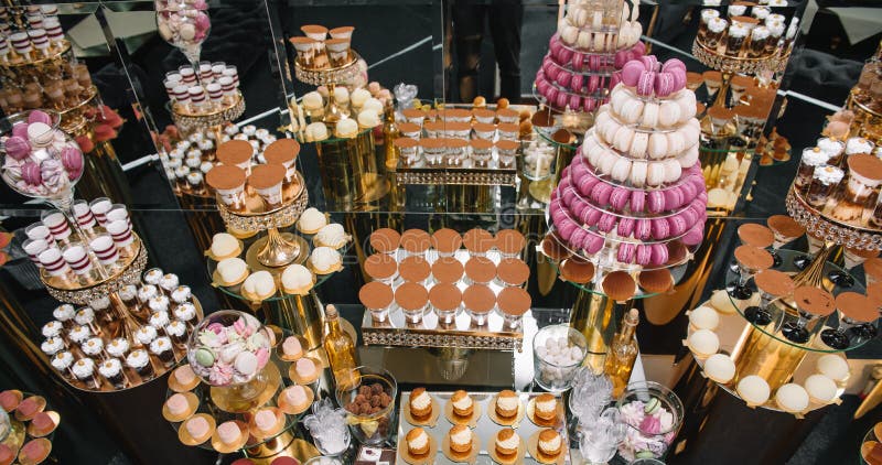 Delicious Wedding Reception Candy Bar Dessert Table. Macaroon on Candy ...