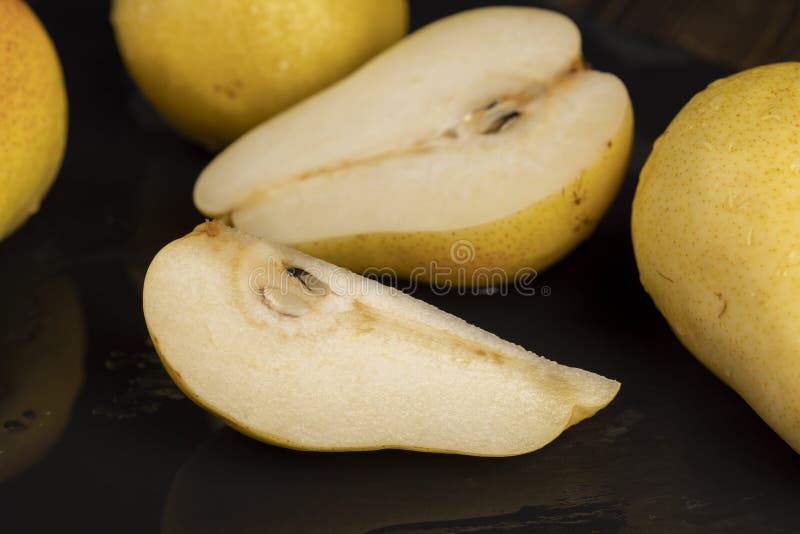 Delicious Yellow Pears with a Red Side Cut into Pieces Stock Photo ...